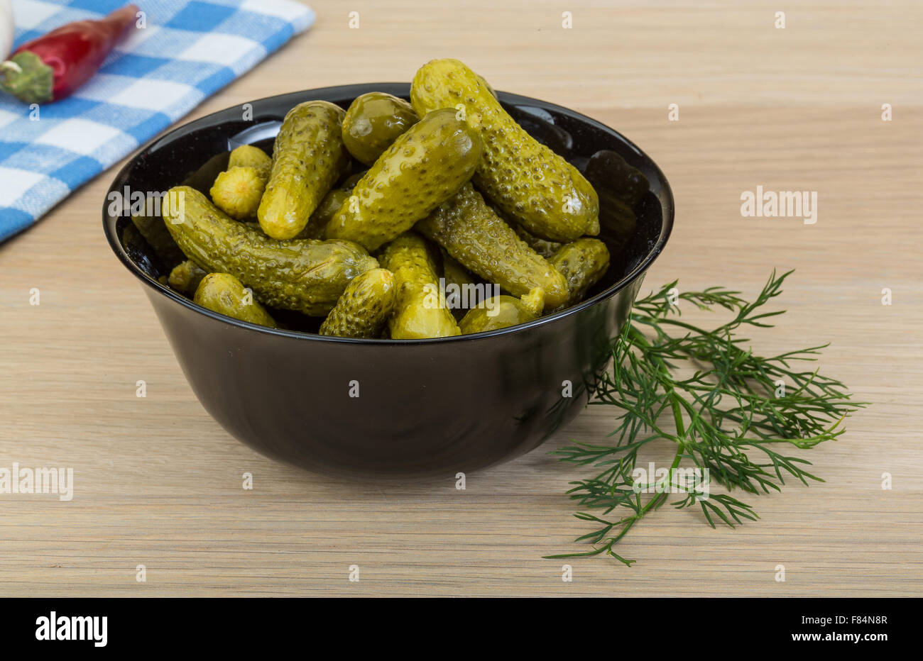 Pickled small cucumber with dill and spices Stock Photo - Alamy