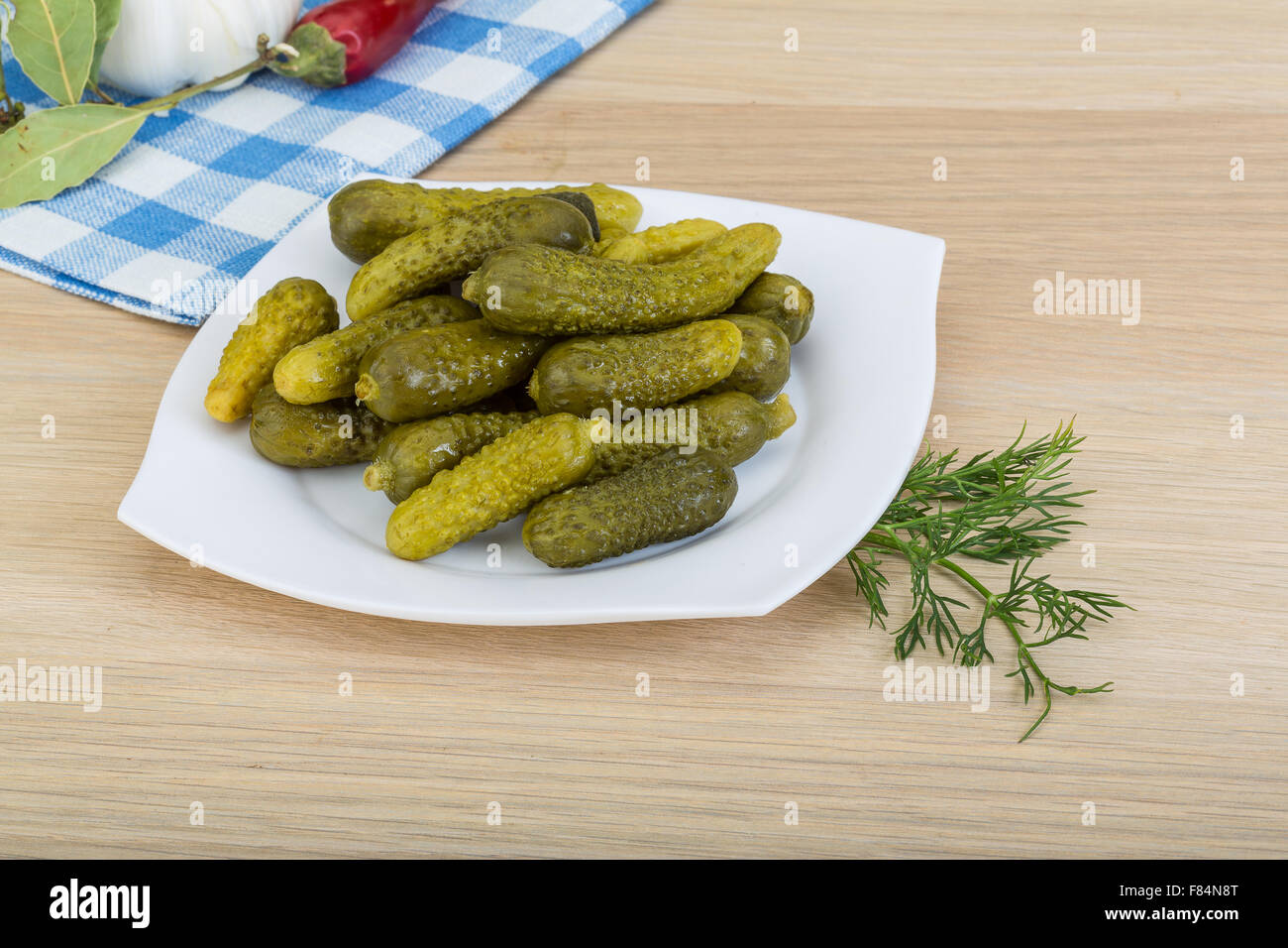 Pickled small cucumber with dill and spices Stock Photo - Alamy
