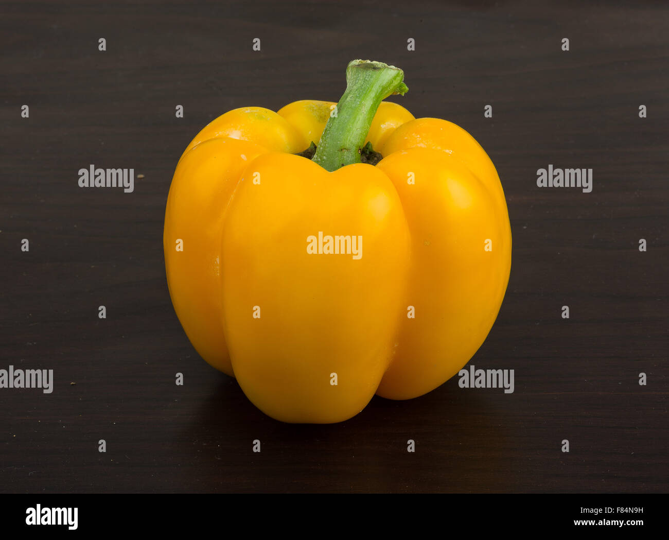 Bright fresh Yellow Bulgarian Pepper on wood background Stock Photo - Alamy