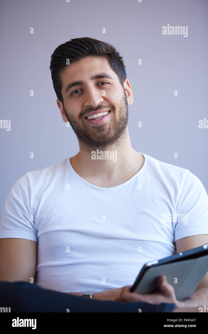 student working on tablet computer at university school modern interior ...