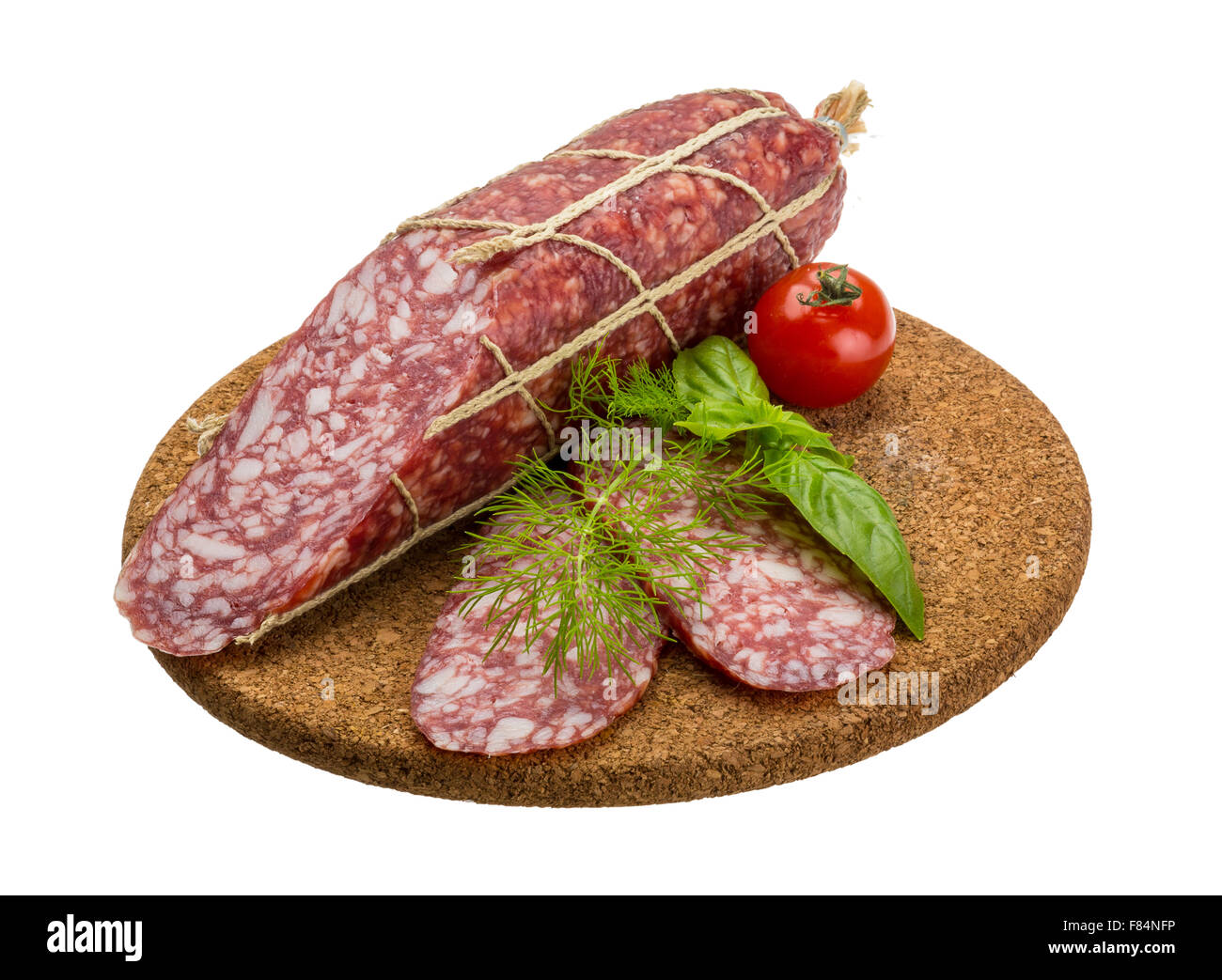 Salami sausages sliced with basil Stock Photo - Alamy