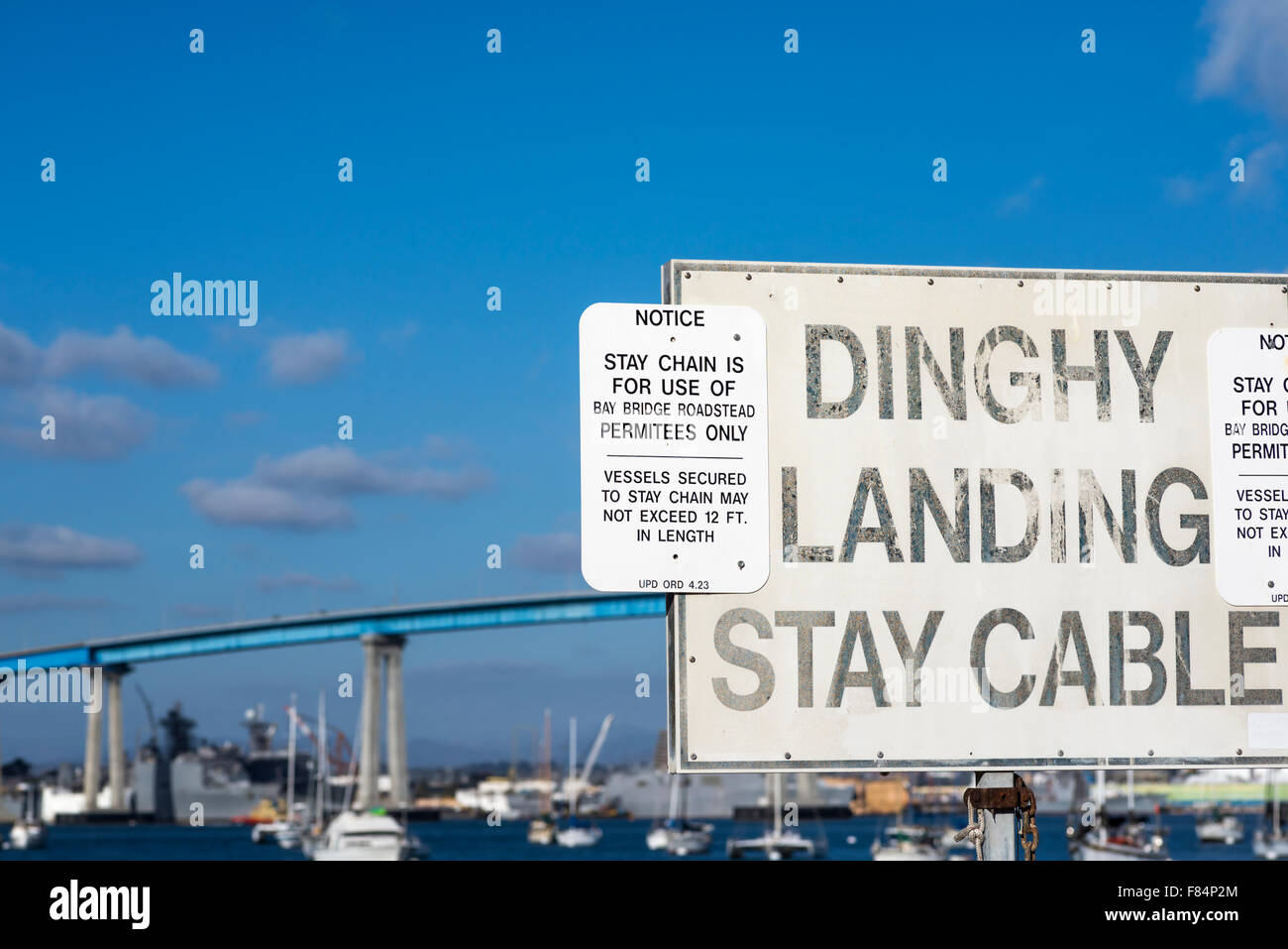 Dinghy Landing Stay Cable sign. Closeup image with harbor background ...