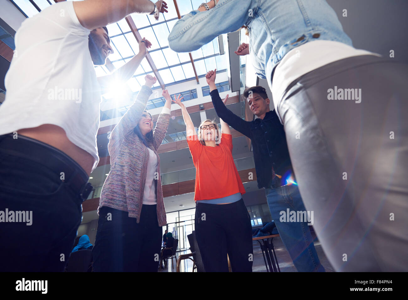 happy students celebrate, friends group together at school, young ...