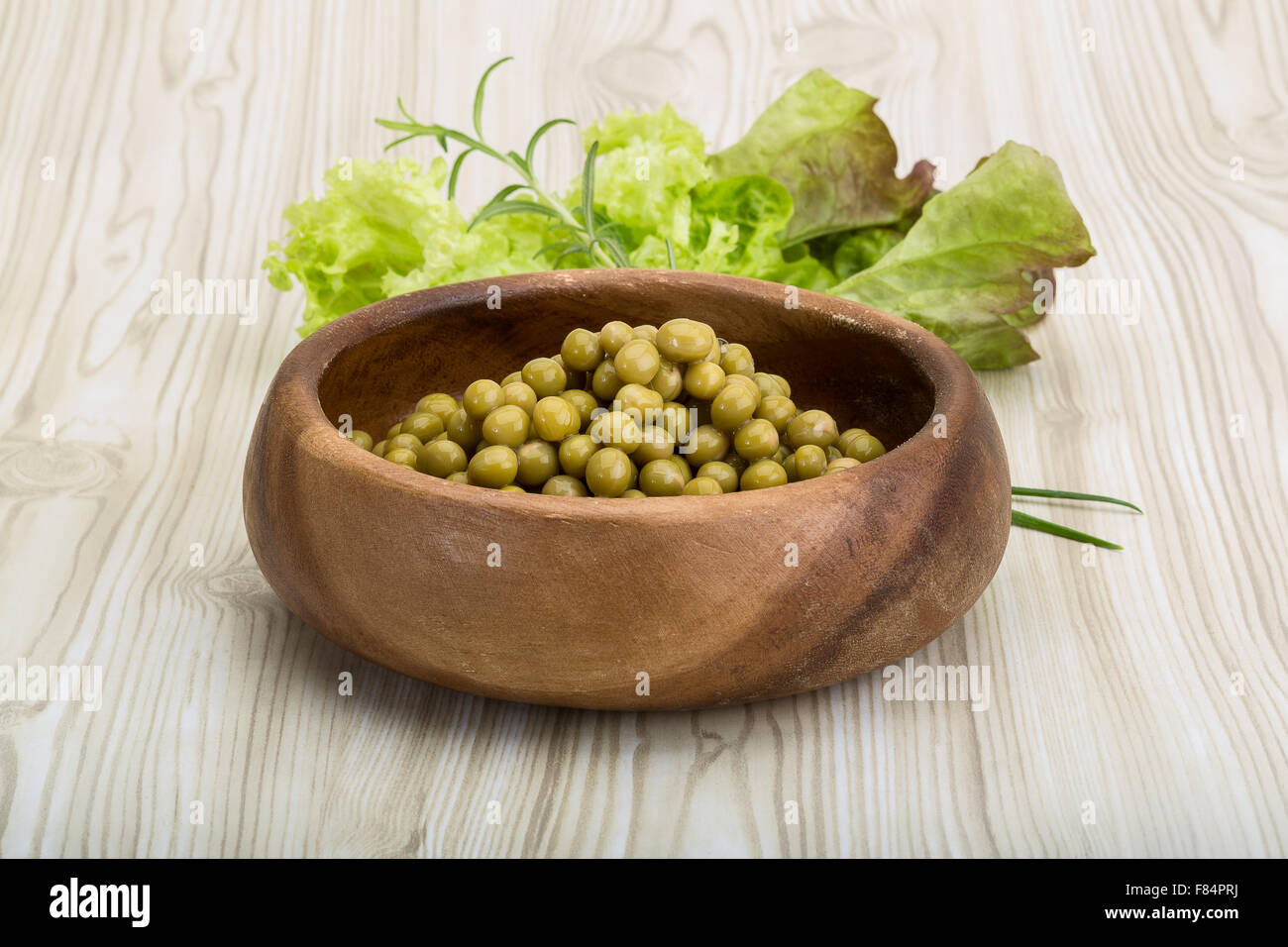 Marinated peas - in the bowl with salad leaves Stock Photo - Alamy