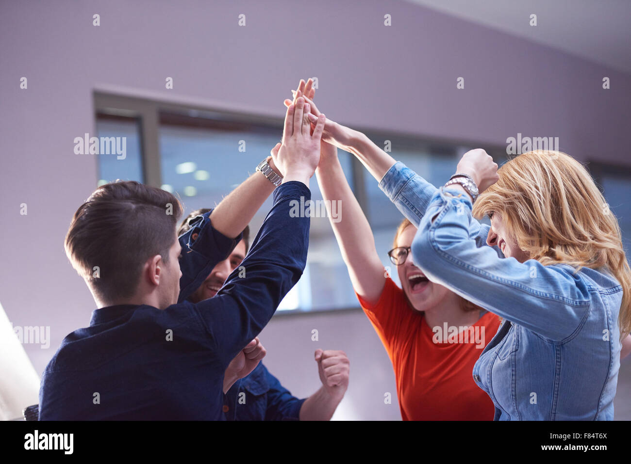 happy students celebrate, friends group together at school, young ...