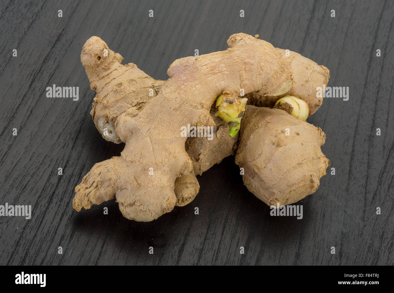 Ginger root on the board - asian food Stock Photo - Alamy