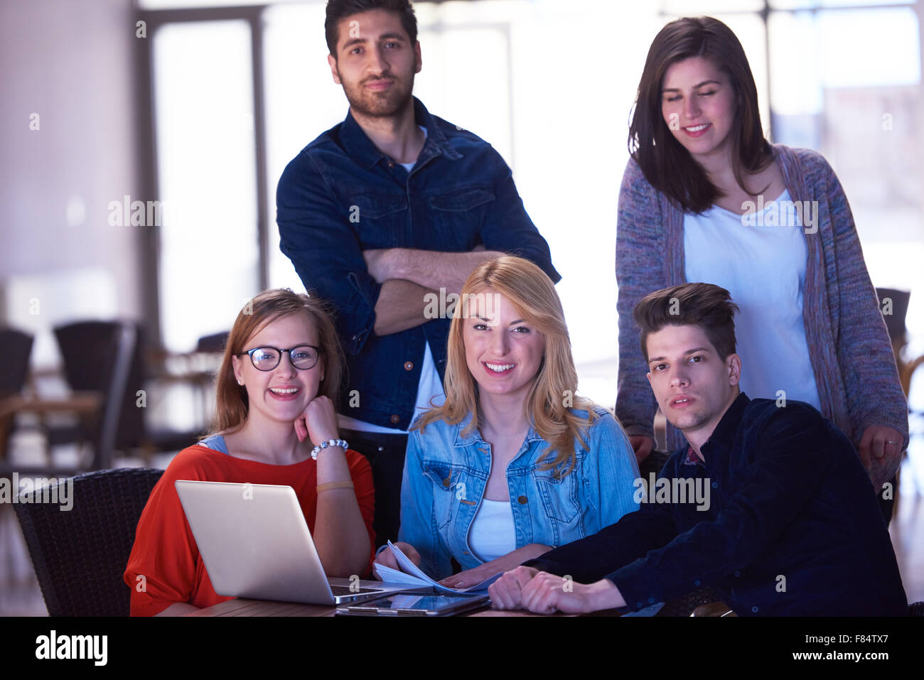 students group standing together as team in modern school university ...