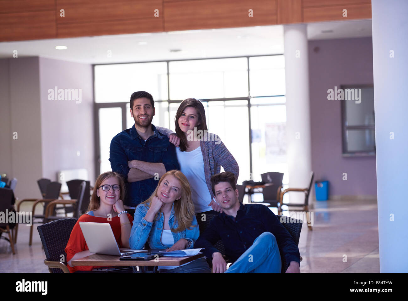 students group standing together as team in modern school university ...