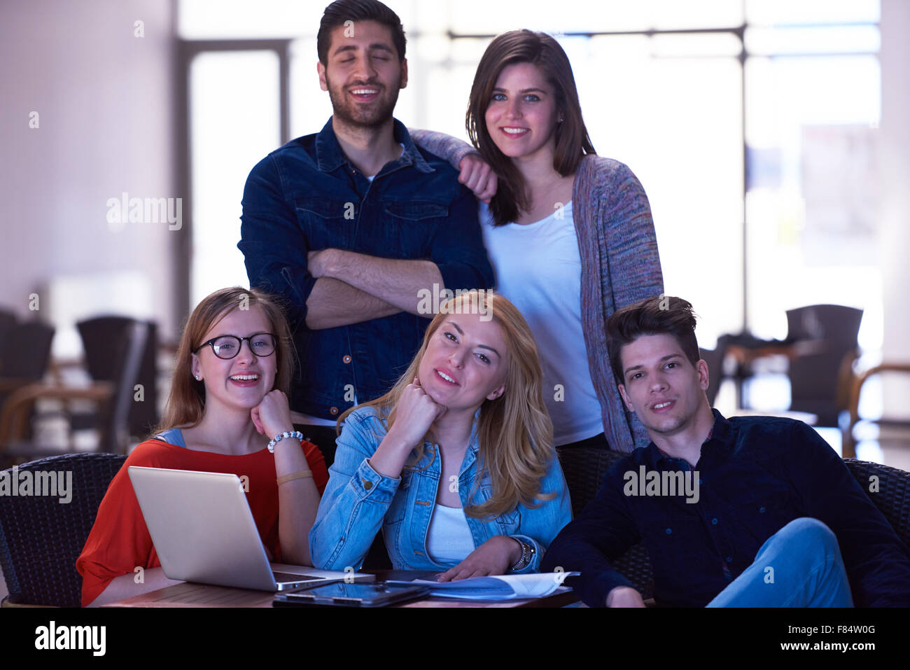 students group standing together as team in modern school university ...