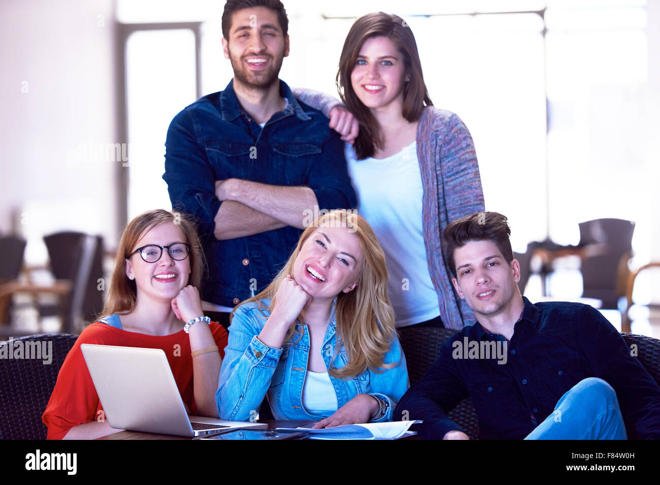 students group standing together as team in modern school university ...