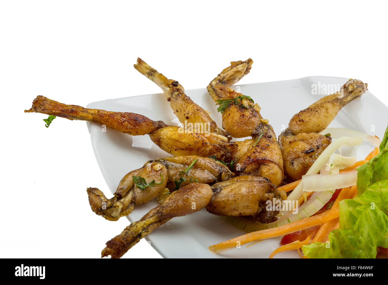 Grilled frog legs - French style Stock Photo - Alamy