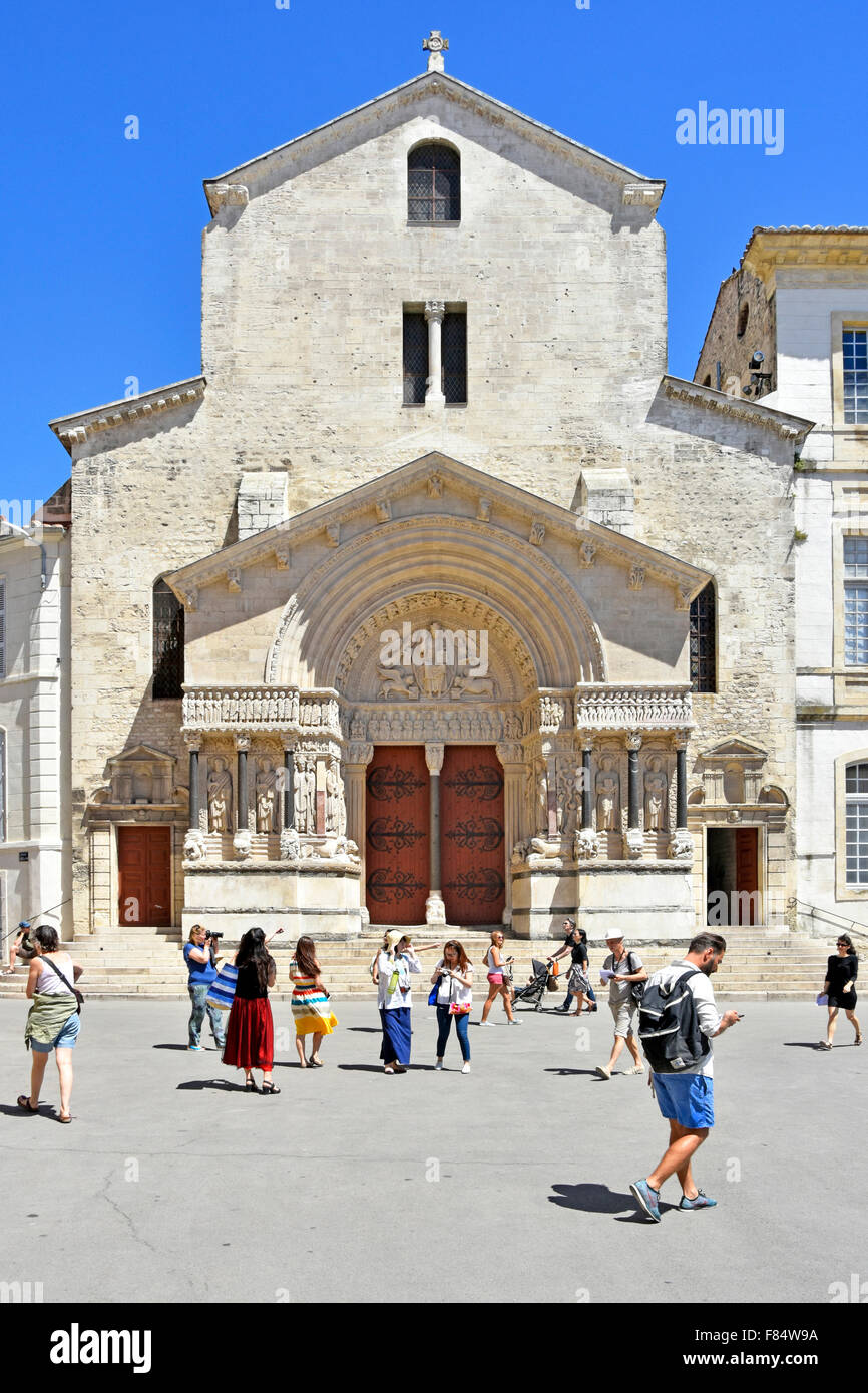 Arles France tourists outside the Roman Catholic church of Saint ...
