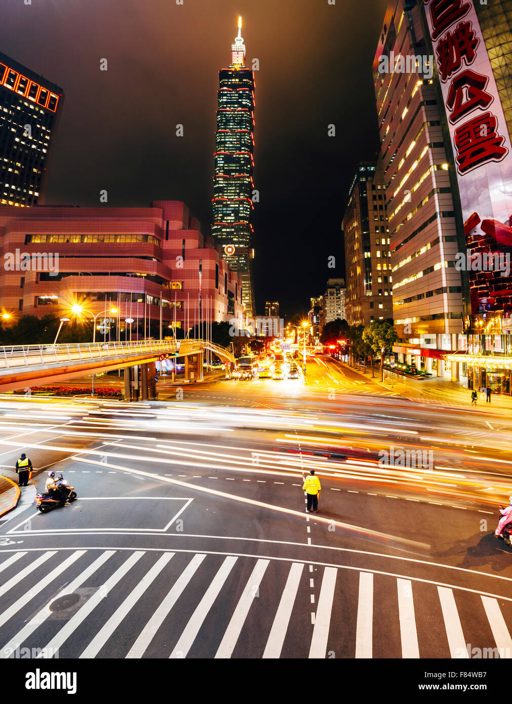 Taipei, Taiwan - night view of busy street and 101 tower Stock Photo ...
