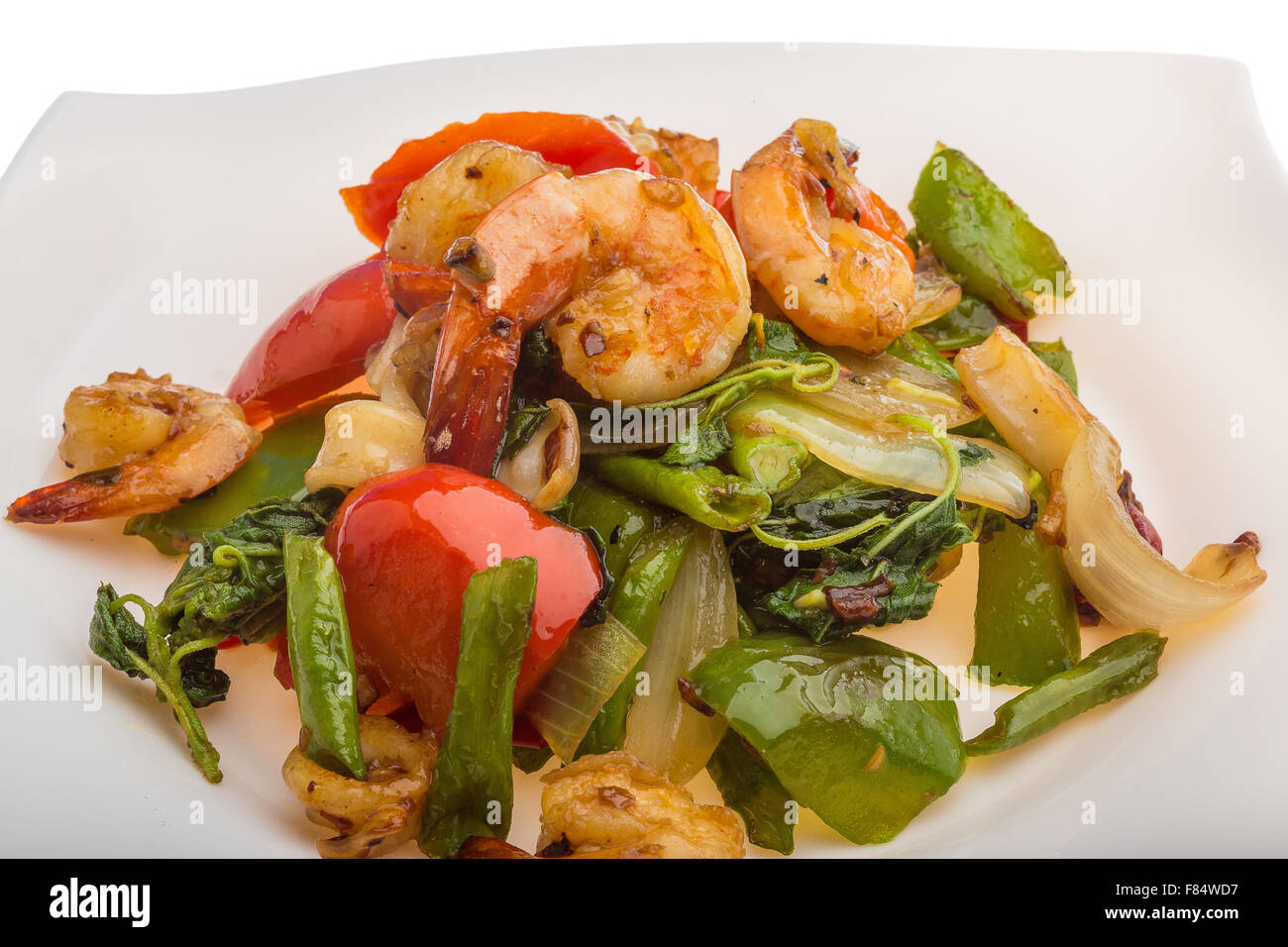 Seafood with vegetables - shrimps and calamari Stock Photo - Alamy