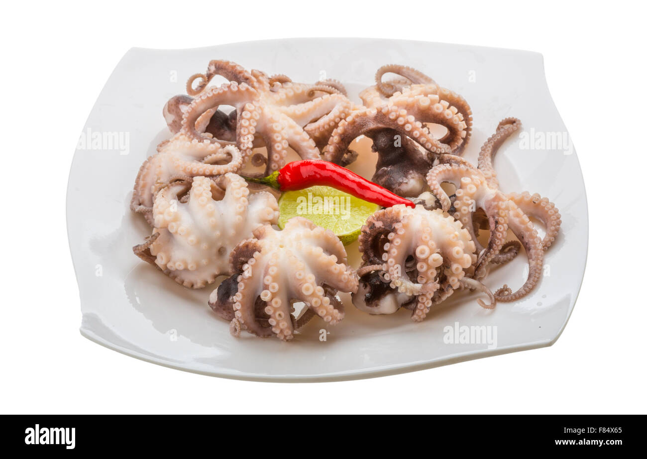 Boiled octopus with pepper and lime Stock Photo - Alamy