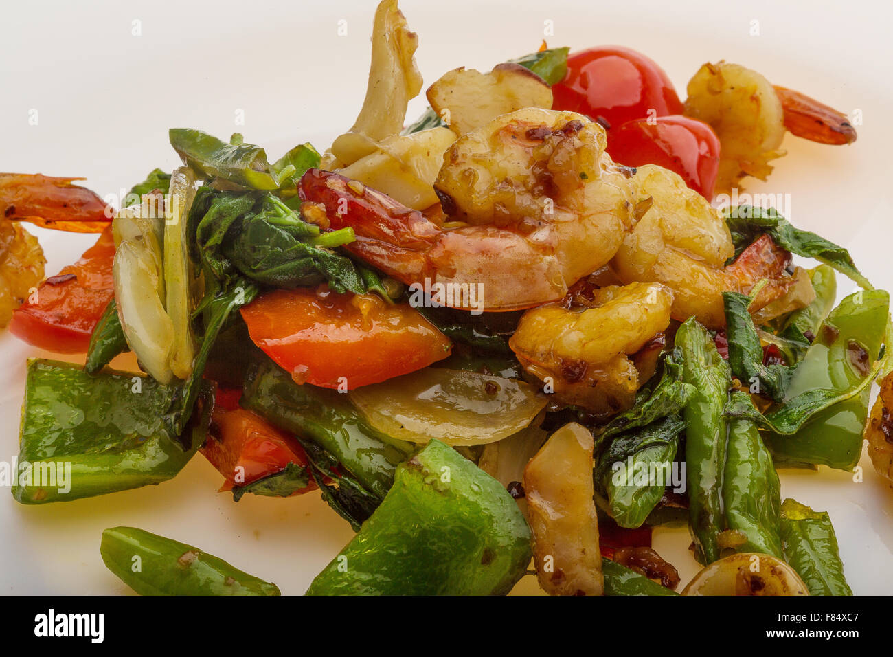 Seafood with vegetables - shrimps and calamari Stock Photo - Alamy