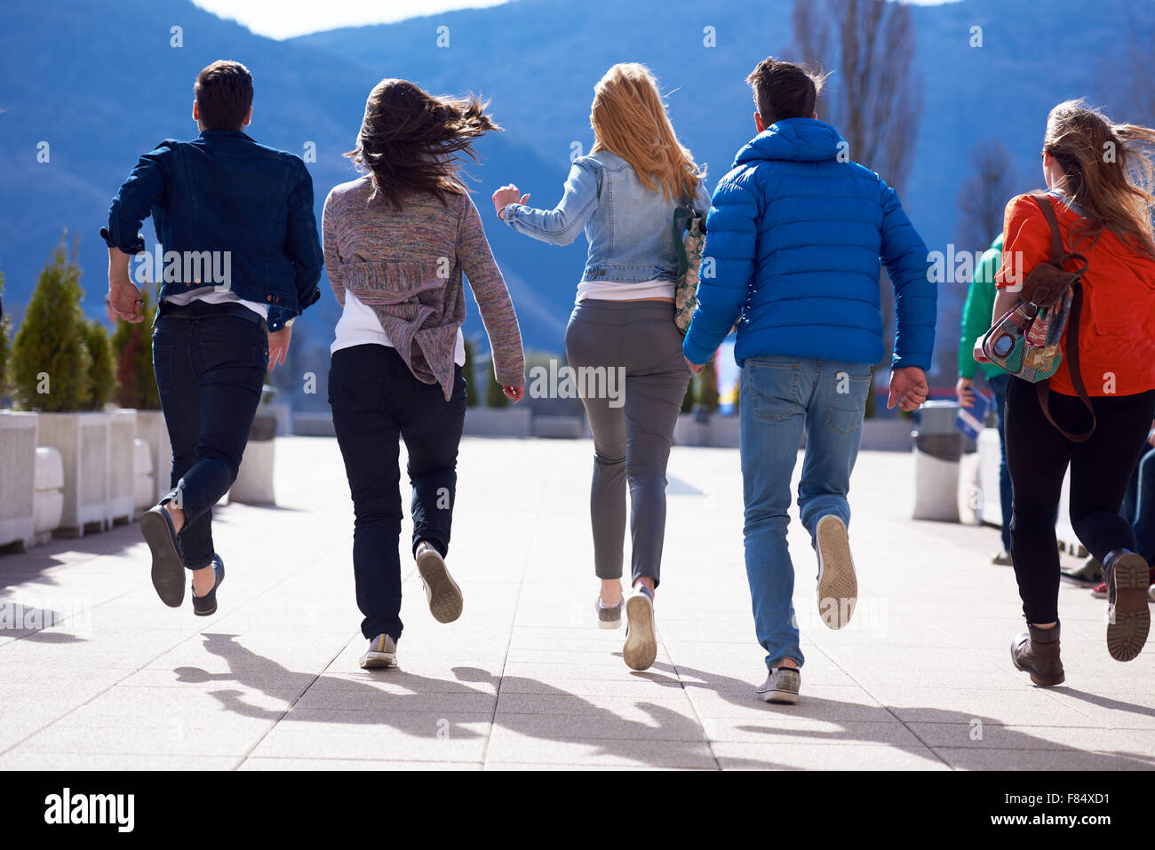 happy students group have fun outdoor in university campus park Stock ...