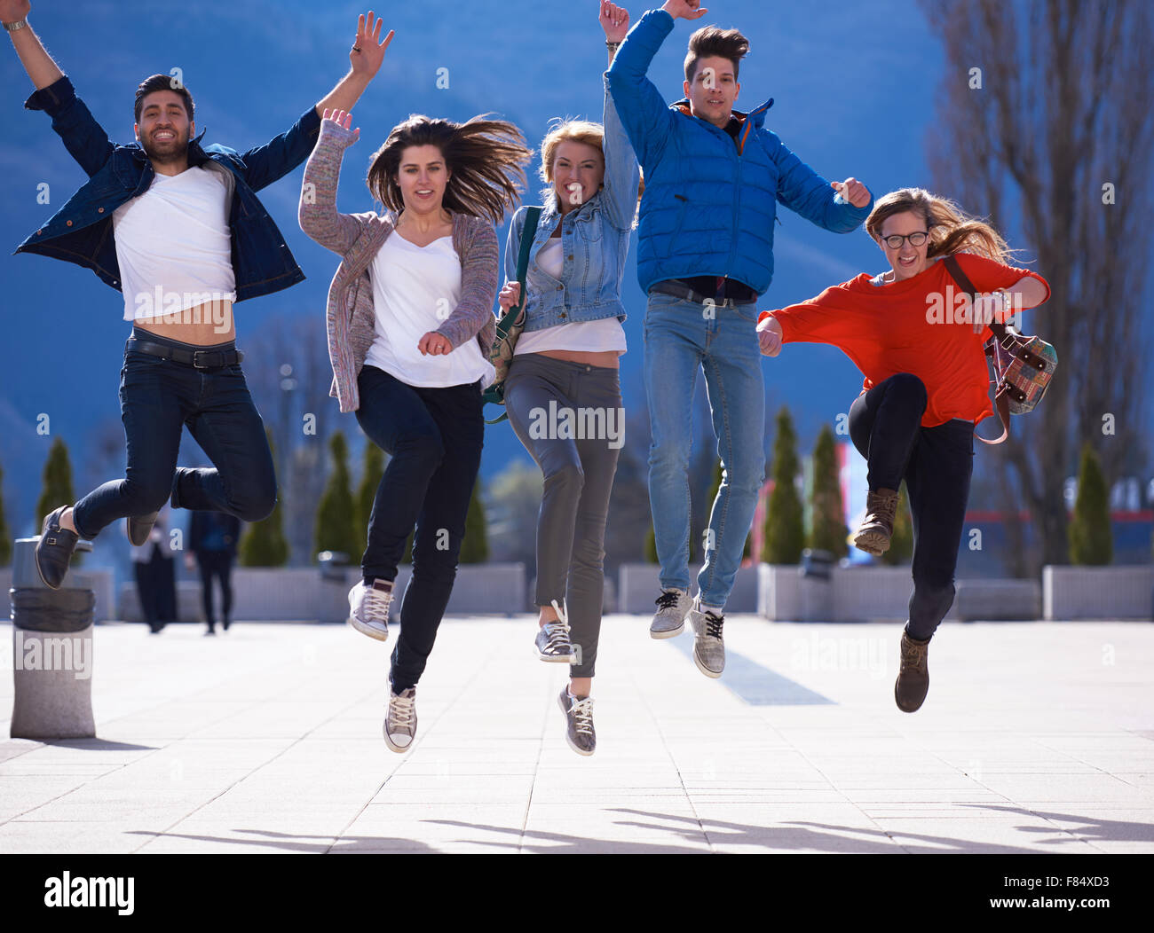 happy students group have fun outdoor in university campus park Stock ...