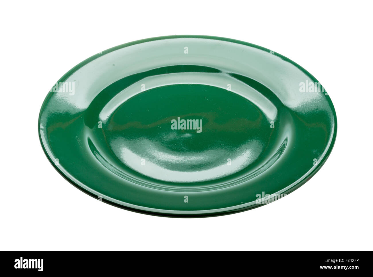 Green plate isolated on white background Stock Photo - Alamy