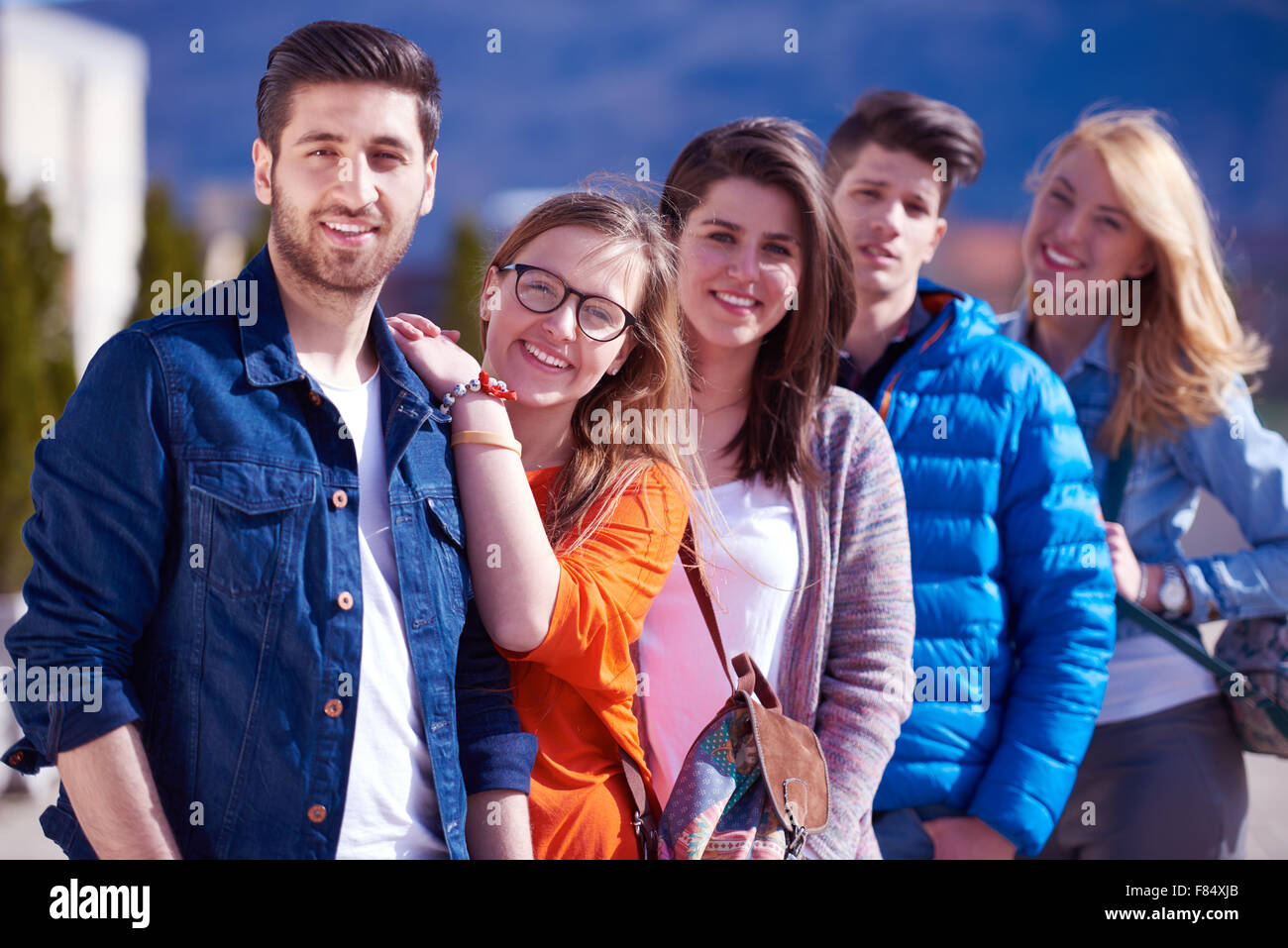 happy students group have fun outdoor in university campus park Stock ...