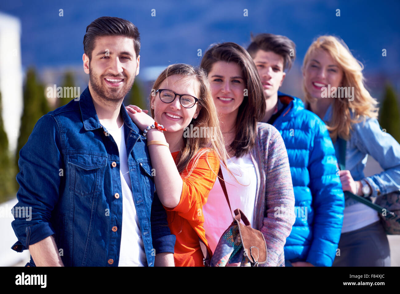 happy students group have fun outdoor in university campus park Stock ...