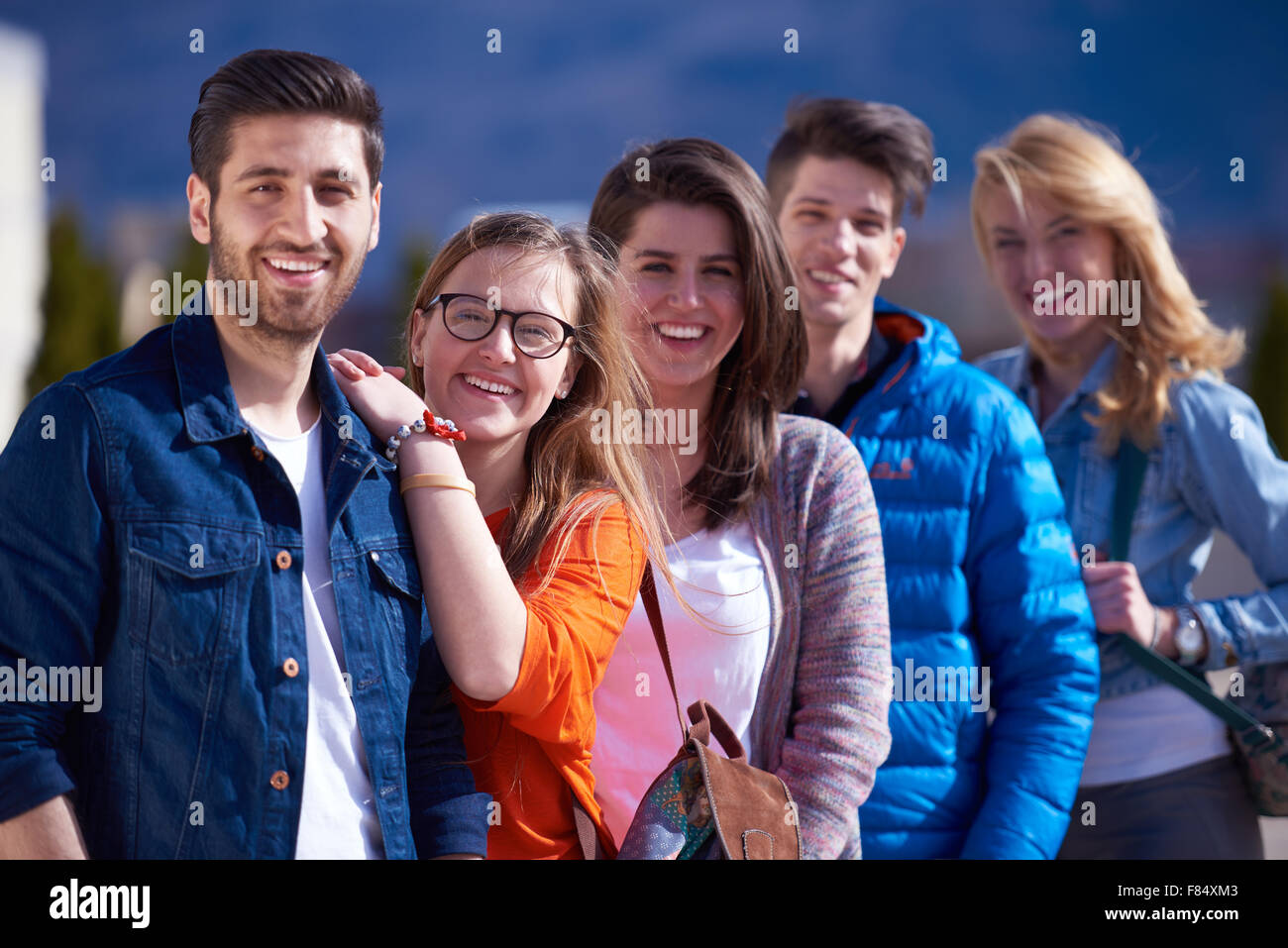 happy students group have fun outdoor in university campus park Stock ...