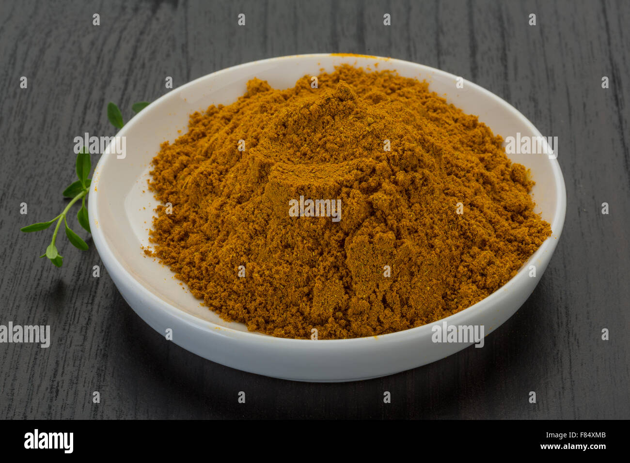 Curry powder in the bowl Stock Photo - Alamy