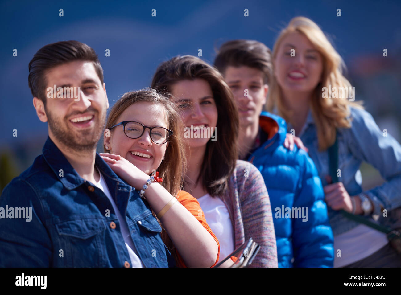 happy students group have fun outdoor in university campus park Stock ...