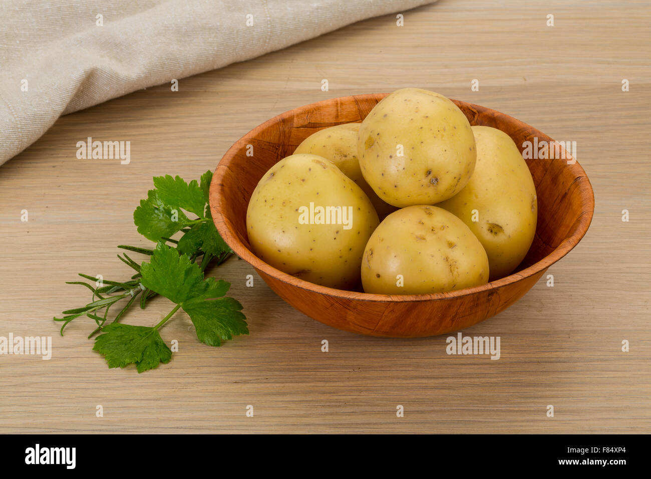 New season Raw potatoes on the desk Stock Photo - Alamy
