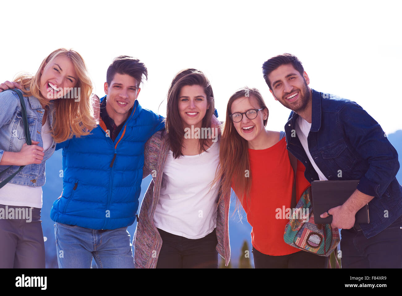 happy students group have fun outdoor in university campus park Stock ...