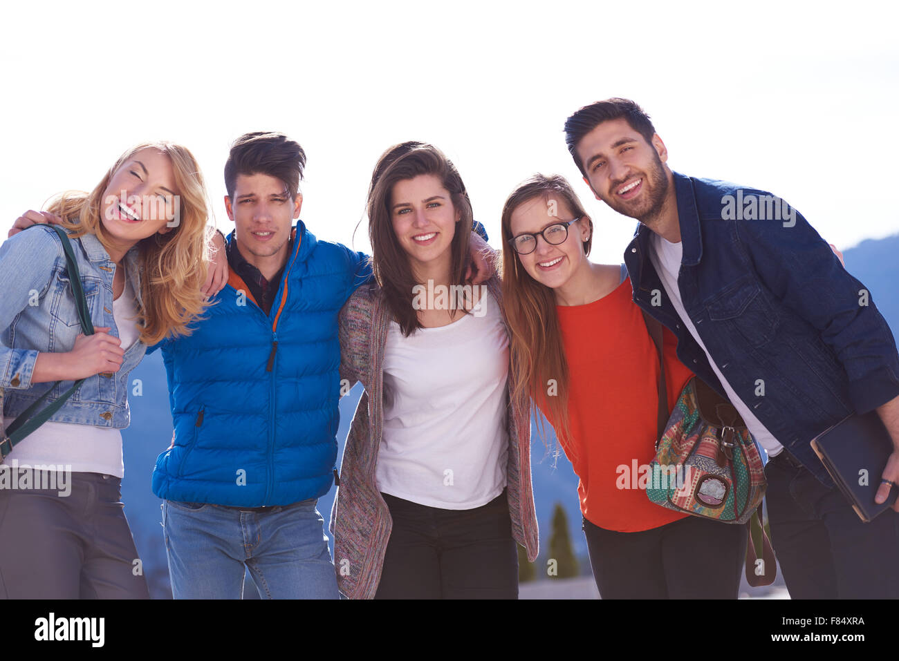 happy students group have fun outdoor in university campus park Stock ...