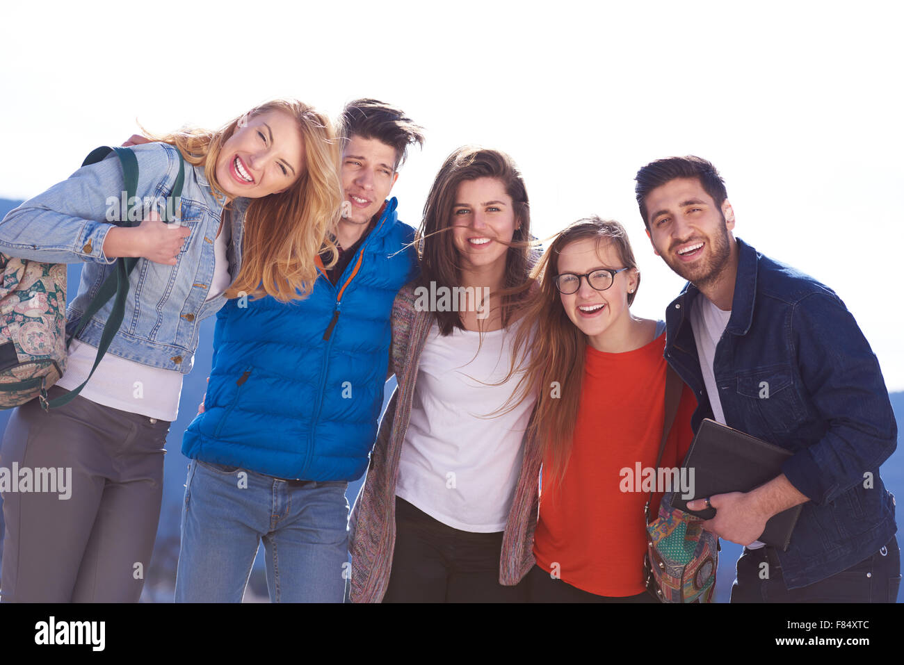 happy students group have fun outdoor in university campus park Stock ...