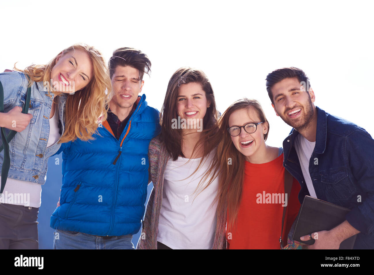 happy students group have fun outdoor in university campus park Stock ...