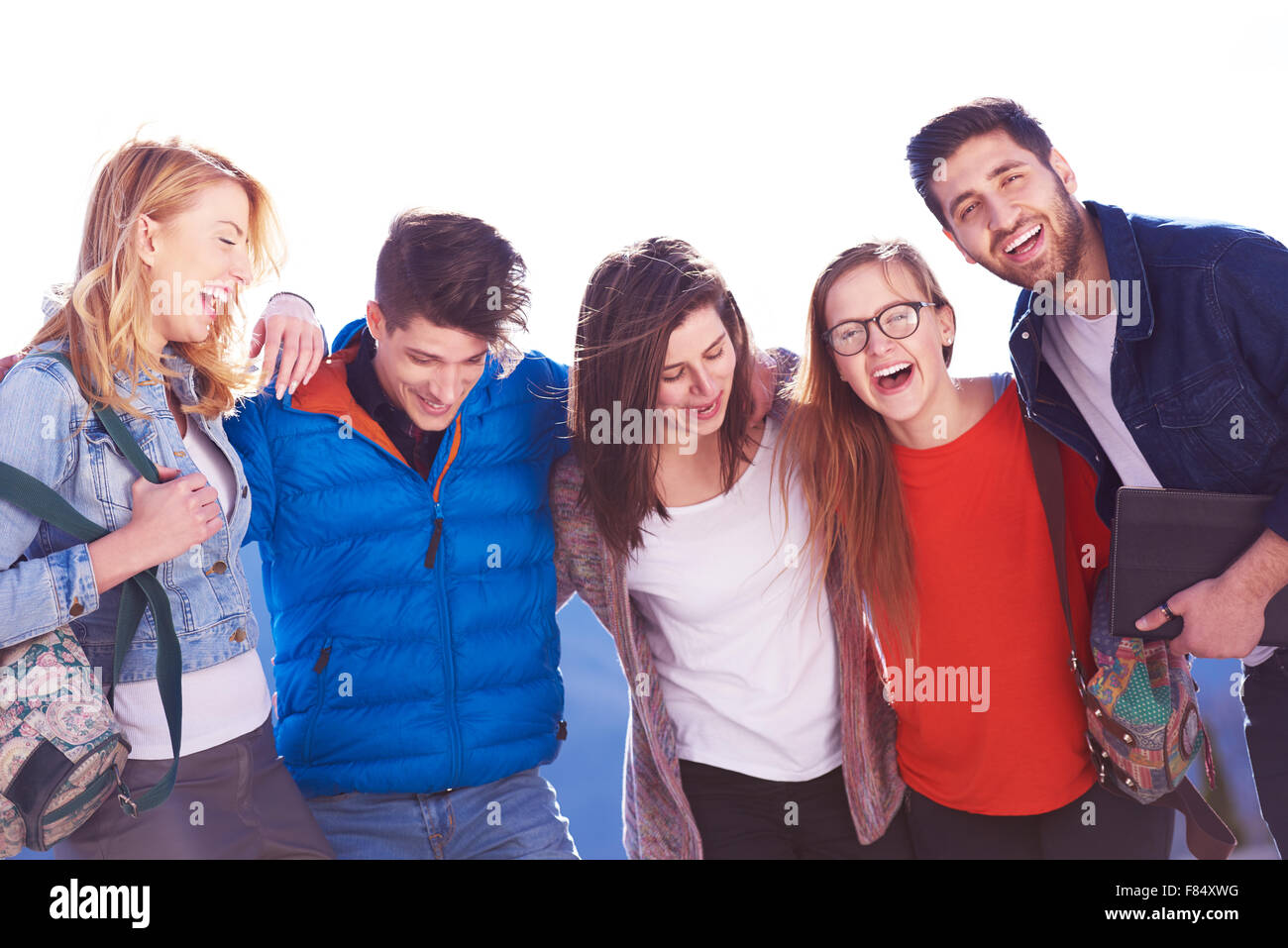 happy students group have fun outdoor in university campus park Stock ...