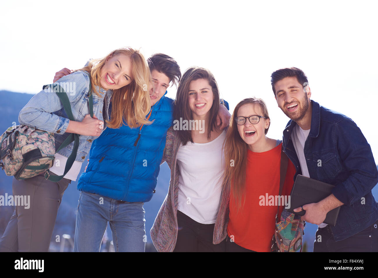 happy students group have fun outdoor in university campus park Stock ...