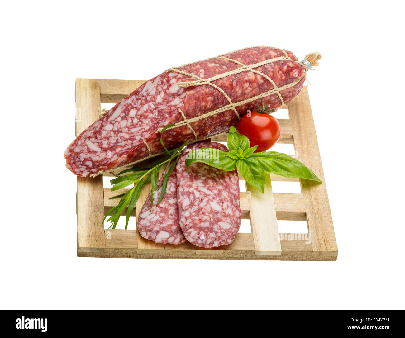 Salami sausages sliced with basil Stock Photo - Alamy