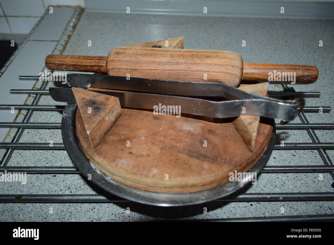 Belna and chakla for chapati making in India Stock Photo - Alamy