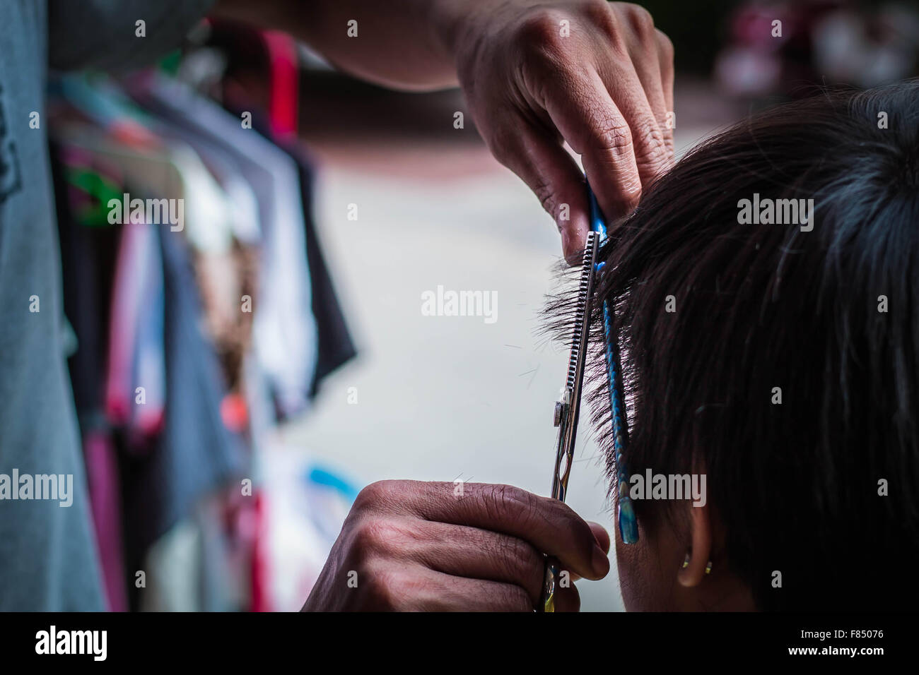 hand clippers haircuts for men in the community Stock Photo - Alamy