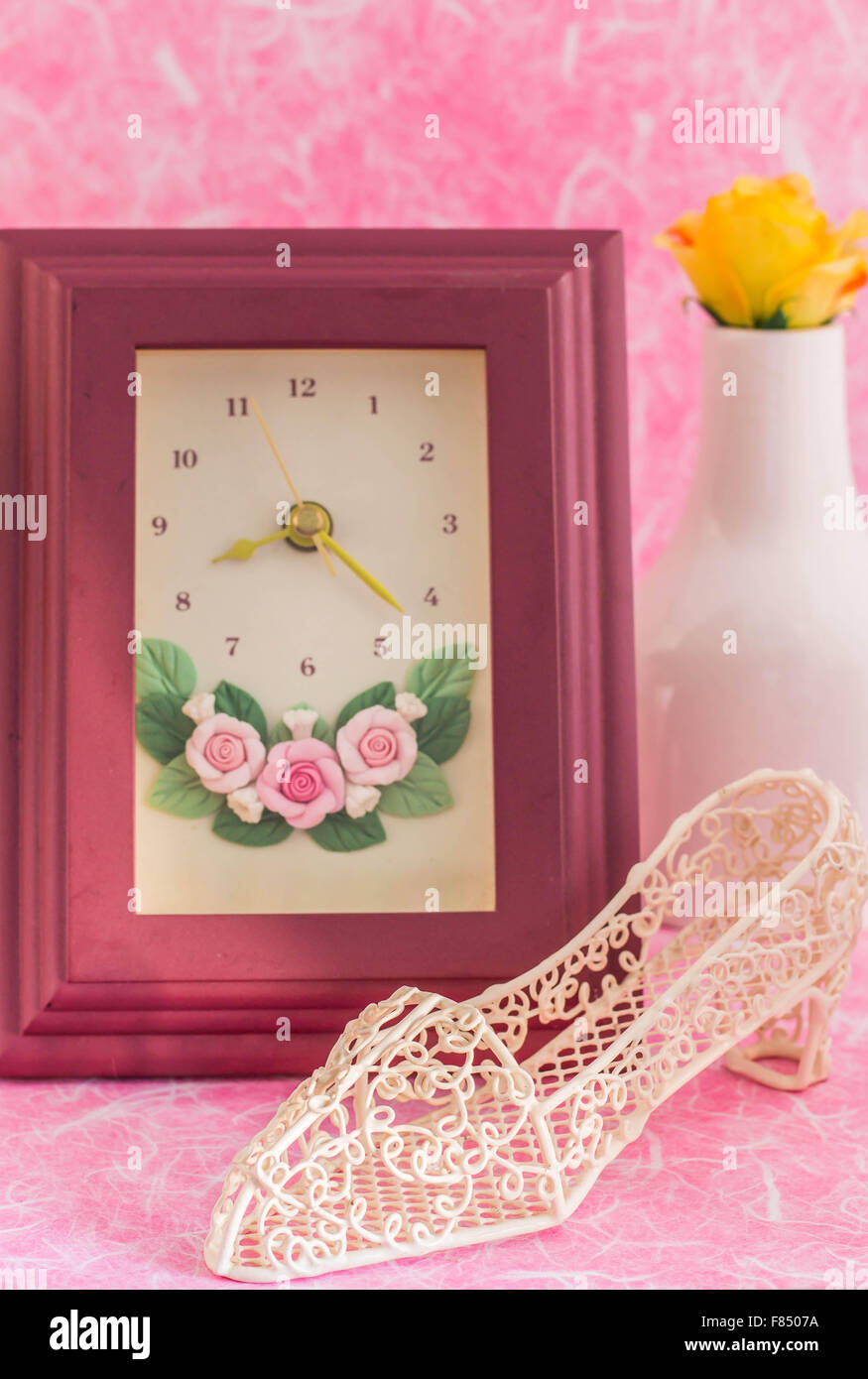 Shoes and picture frames on the pink background Stock Photo - Alamy