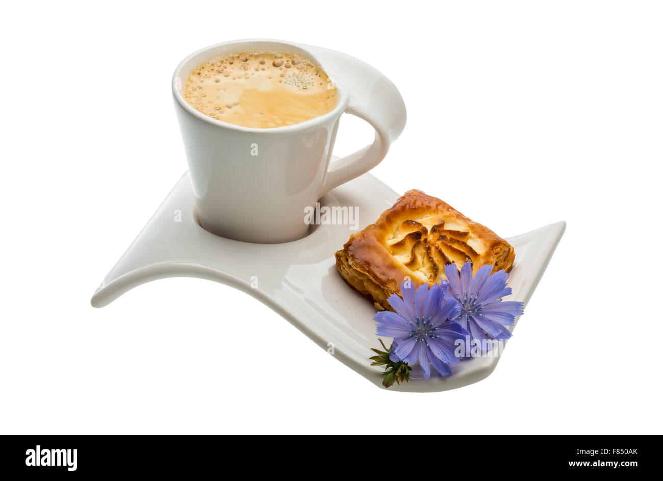 Coffee with pastry and blue flower Stock Photo - Alamy