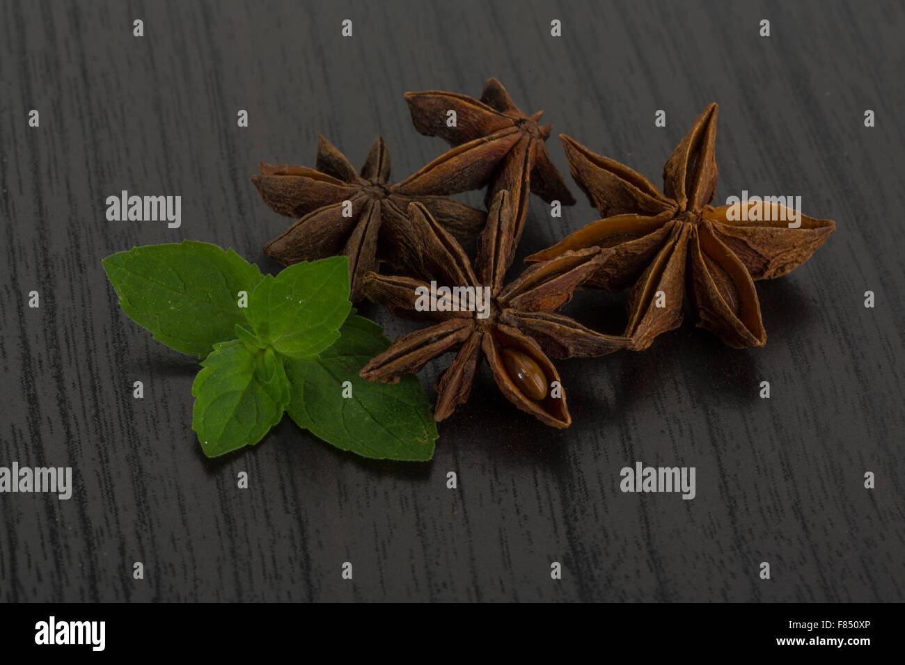 Star anise with mint leaves Stock Photo - Alamy