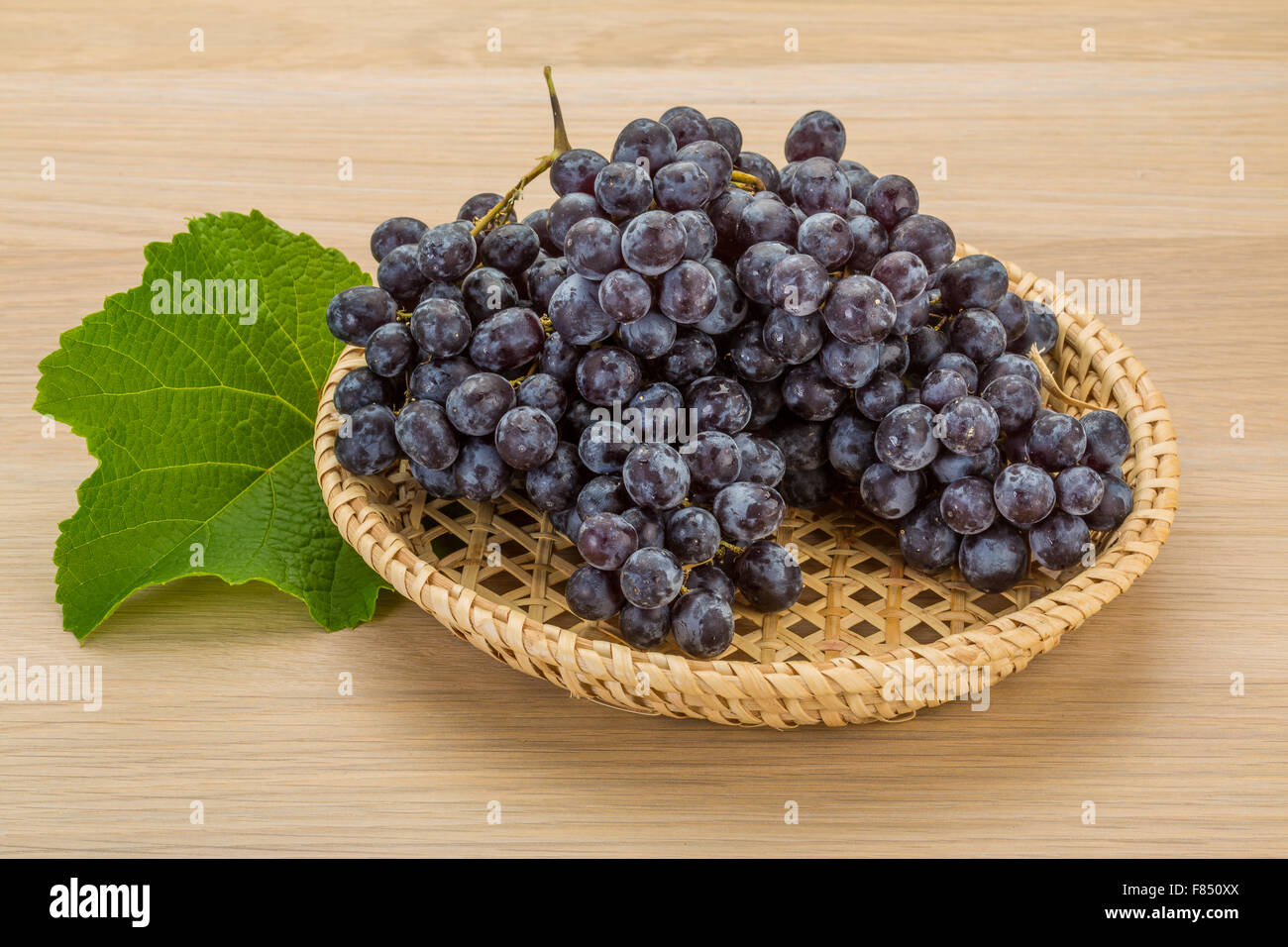 Red grape branch with leaf Stock Photo - Alamy