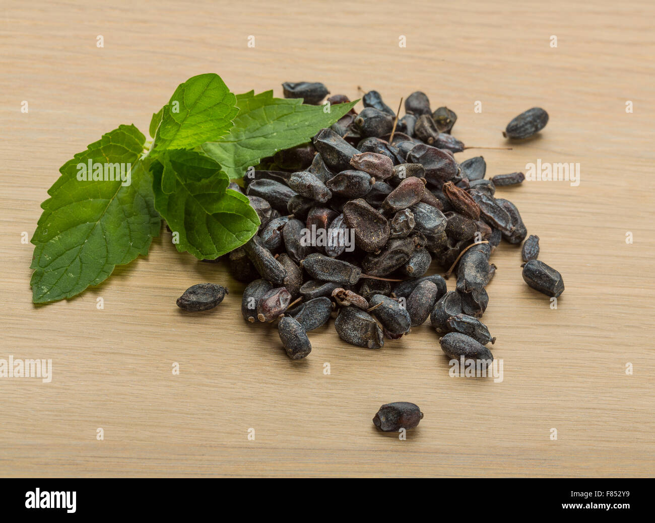 Dry blue berberis with mint Stock Photo - Alamy