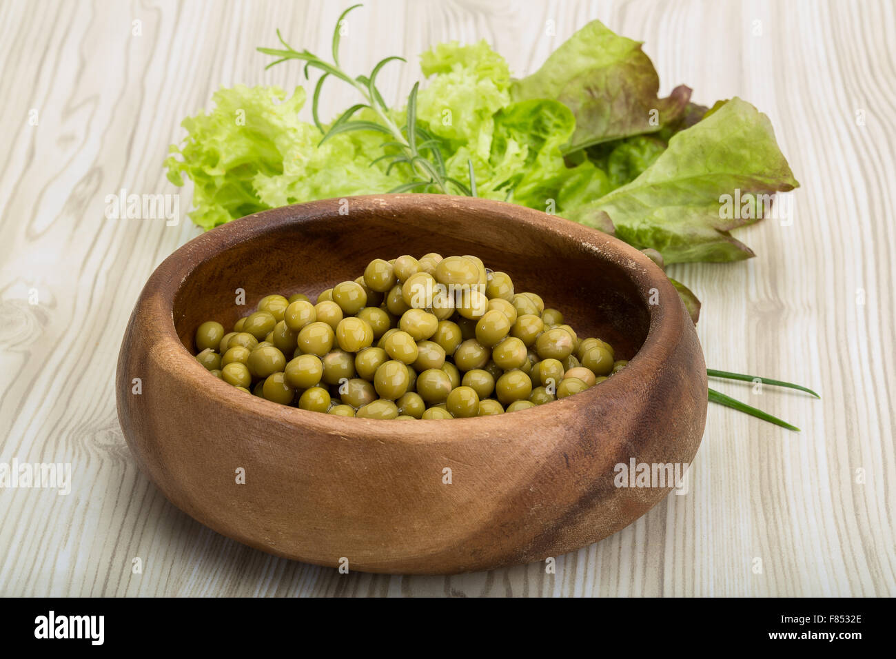 Marinated peas - in the bowl with salad leaves Stock Photo - Alamy