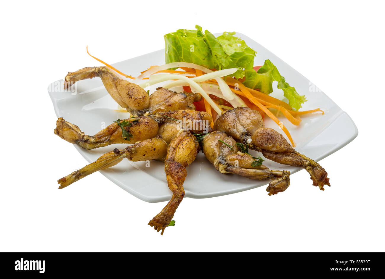 Grilled frog legs - French style Stock Photo - Alamy