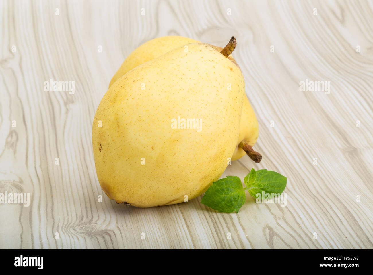 Bright ripe Yellow pears with mint leaves Stock Photo - Alamy