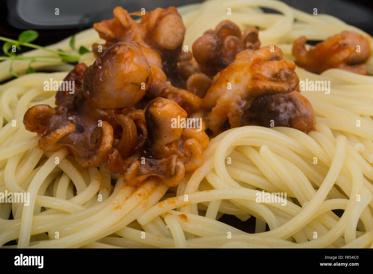 Pasta with octopus - italian spaghetti marinara Stock Photo - Alamy