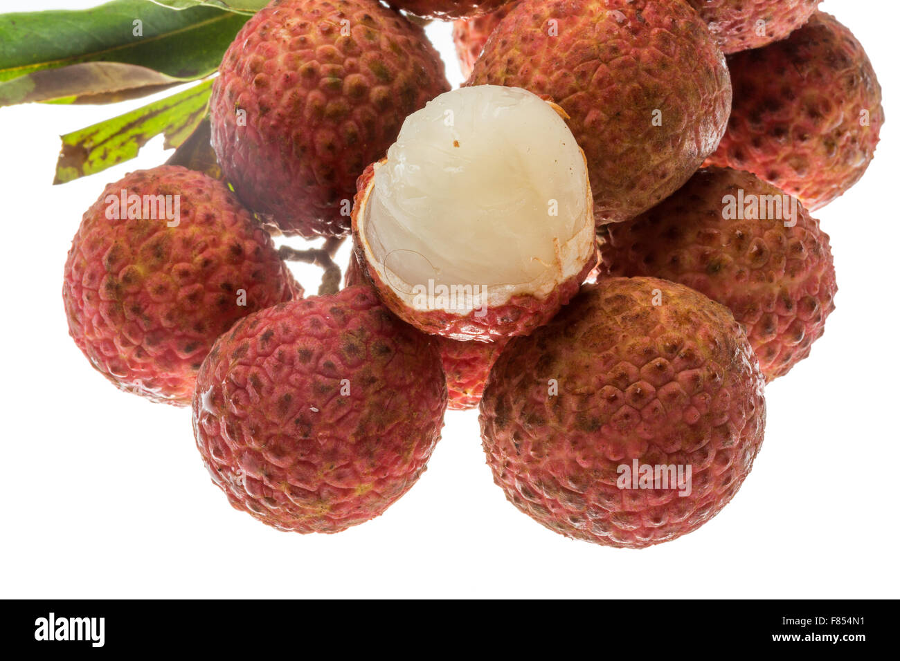 Asian fruit lychee heap isolated Stock Photo - Alamy