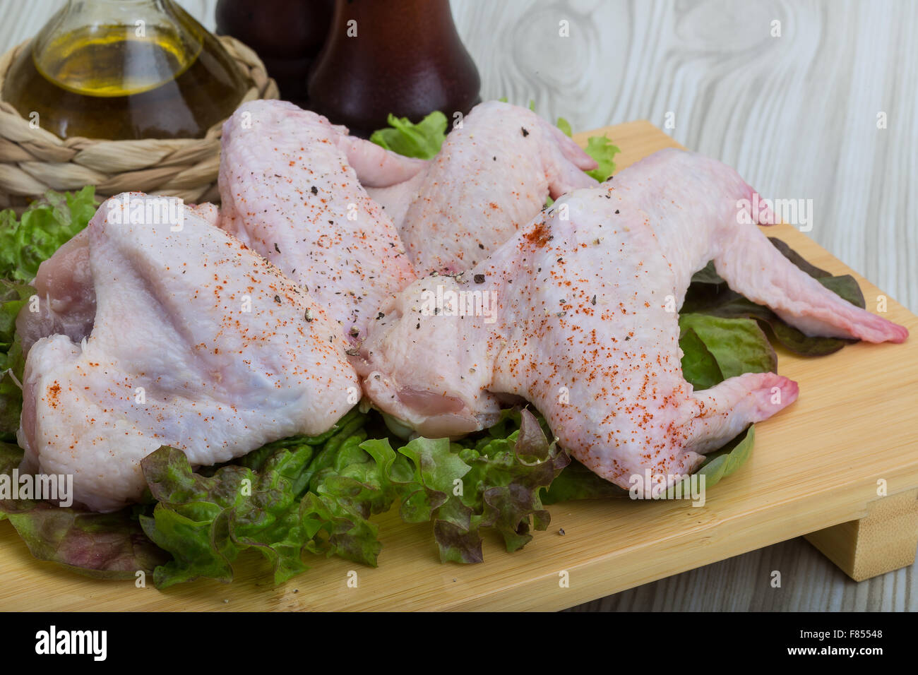 Raw chicken wings with spices - ready for cooking Stock Photo - Alamy