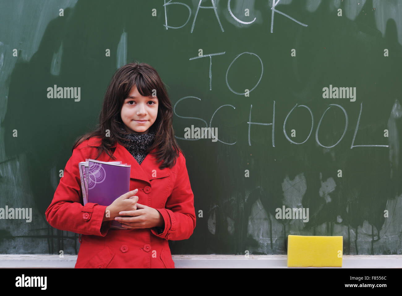 happy school girl on math classes finding solution and solving problems ...